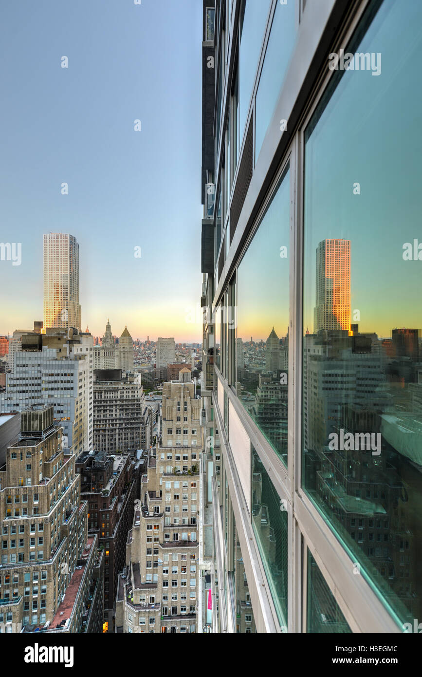 Skyscrapers of downtown Manhattan reflecting in the window in the ...