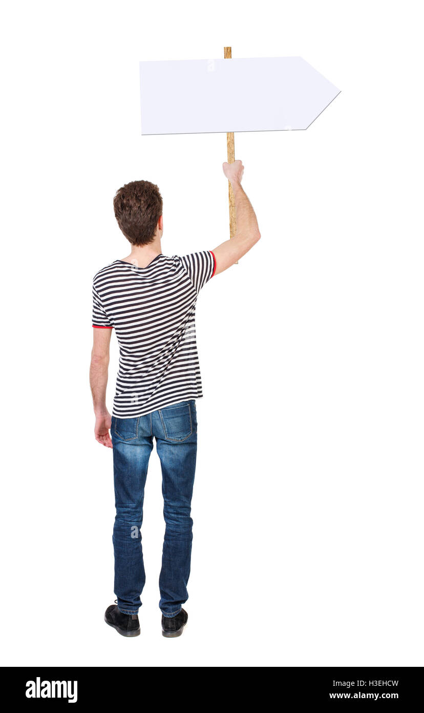 Back view man showing sign board. man holds information plate. Rear ...
