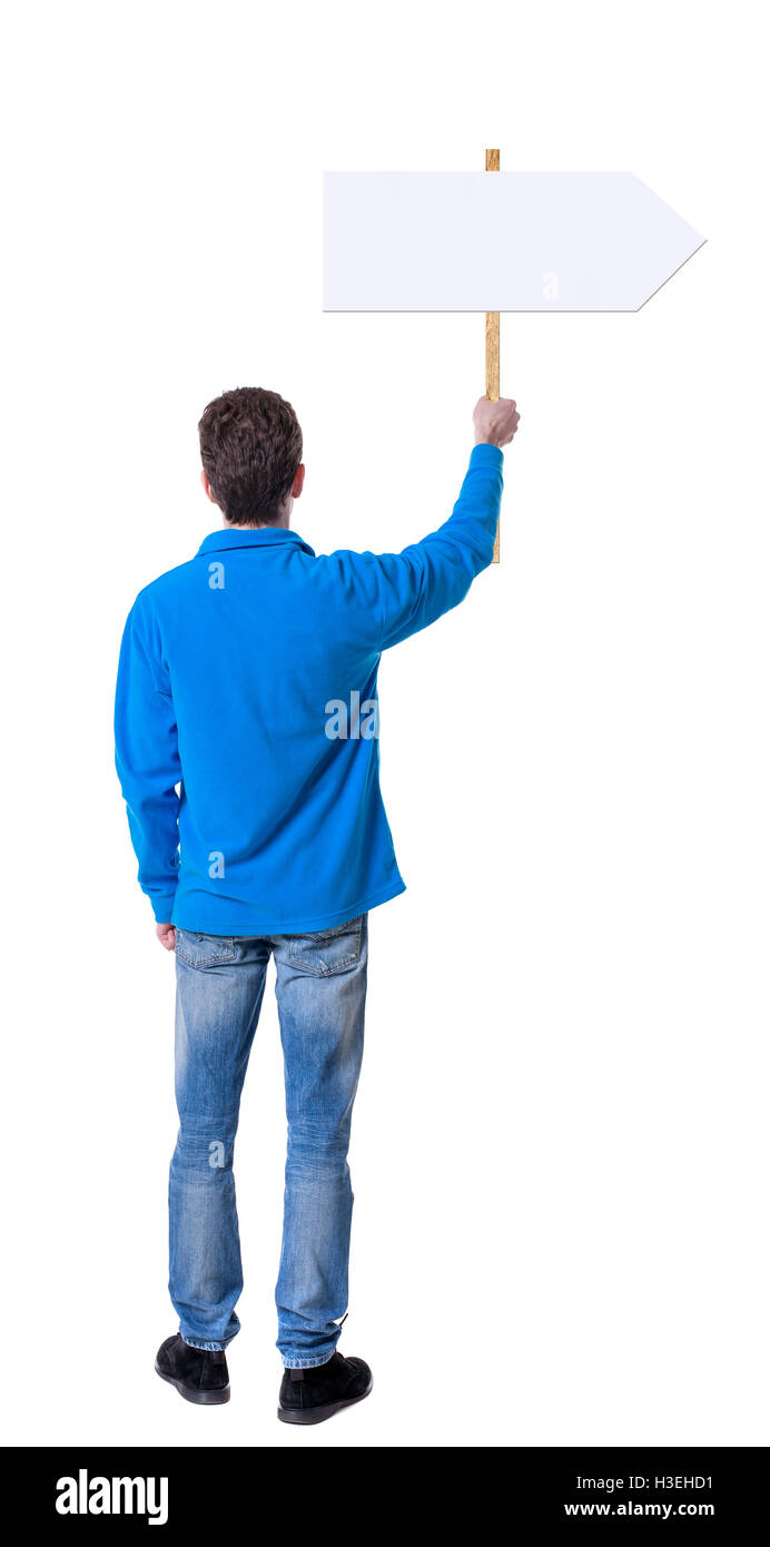 Back view man showing sign board. man holds information plate. Rear ...