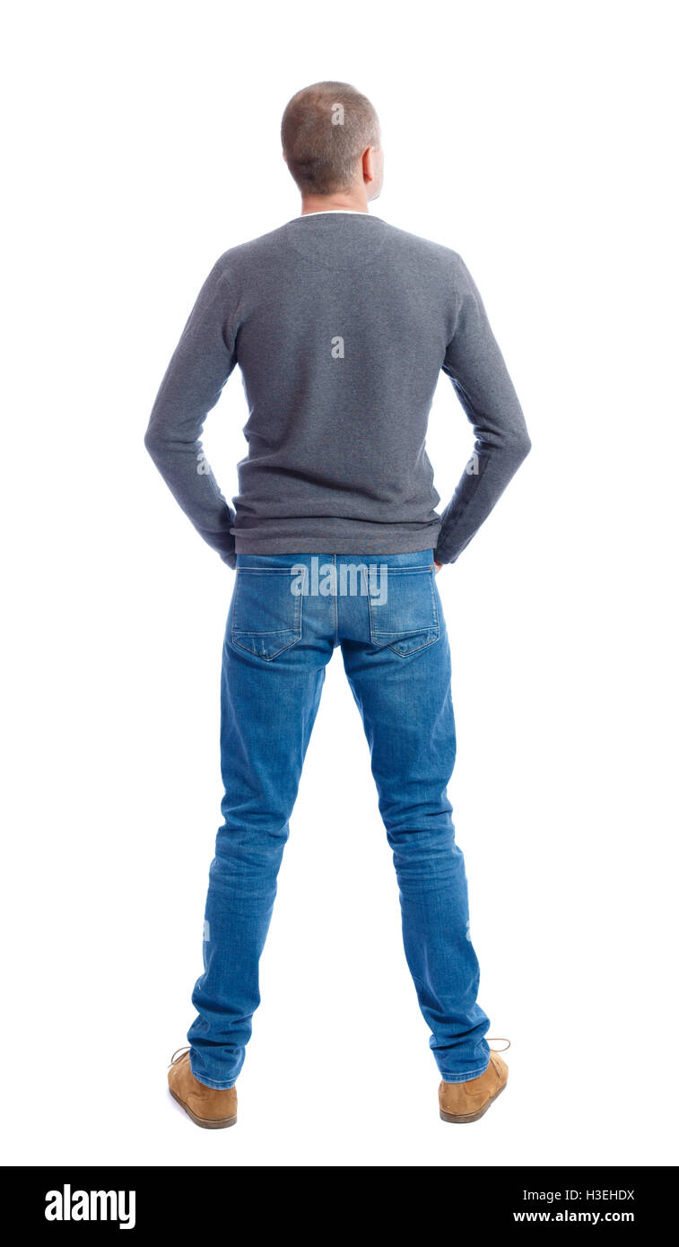 Back view of man in jeans. Standing young guy. Rear view people ...