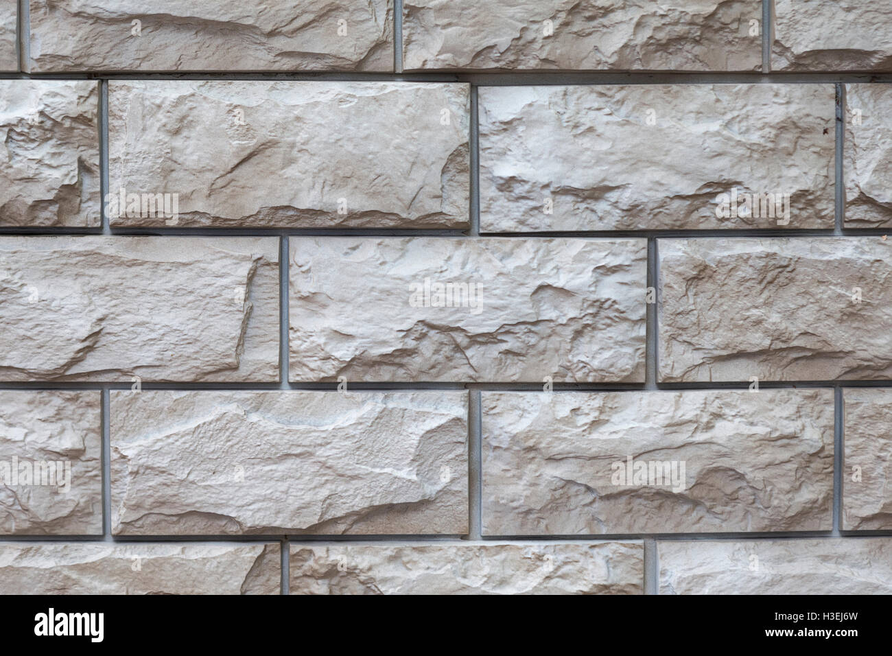 Wall external finish of the blocks and bricks country house Stock Photo ...