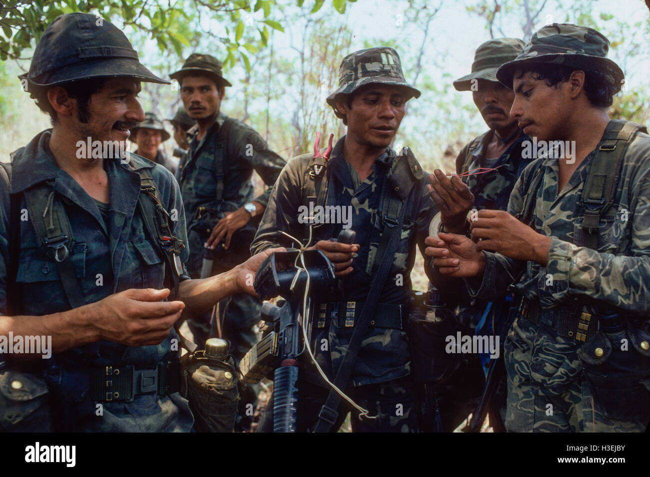 El Salvador, 1986. Government soldiers on patrol in in Morazan Province ...