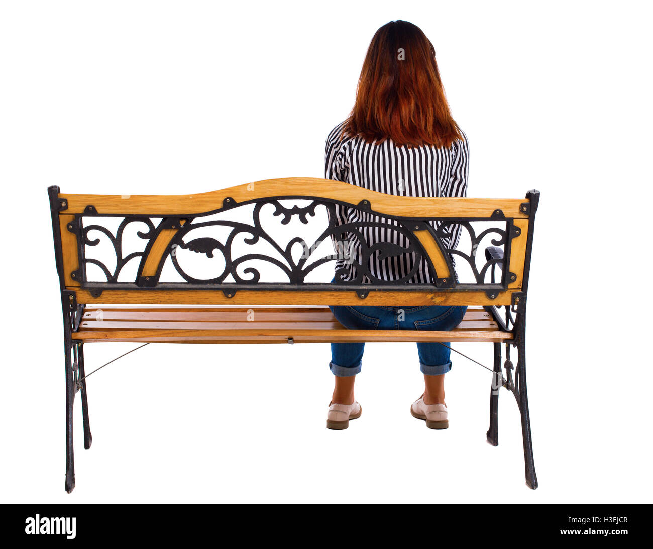 Back view of a woman sitting on a bench. girl watching. Rear view ...