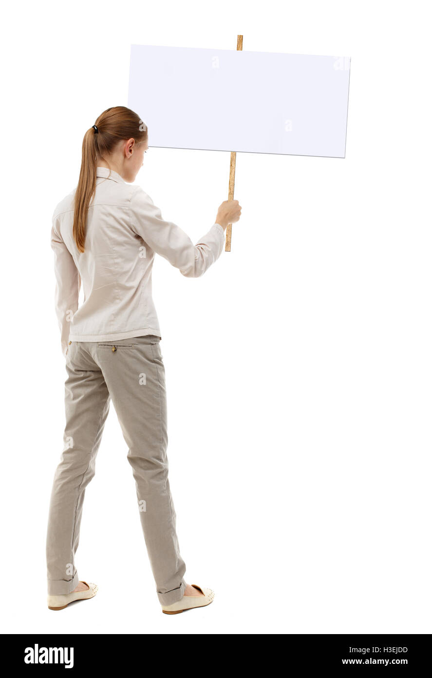 Back view woman showing sign board. man holds information plate. Rear ...