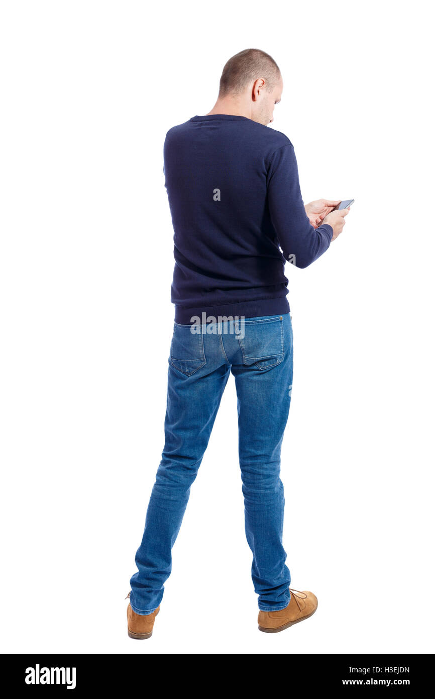 back view of man in suit talking on mobile phone. rear view people ...