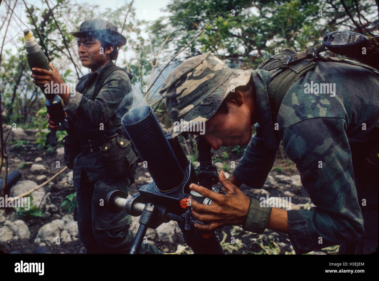 Goernment soldiers fire mortar rounds at guerilla-held positions in Morazan Province, El ...