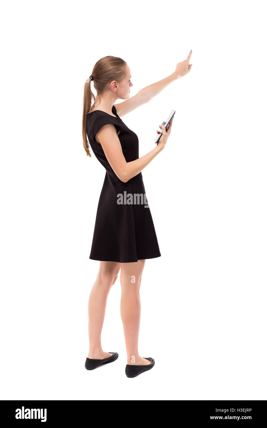 back view of pointing young beautiful woman and using a mobile phone ...