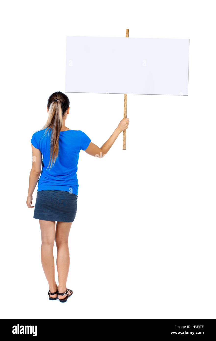 Back view woman showing sign board. man holds information plate. Rear ...