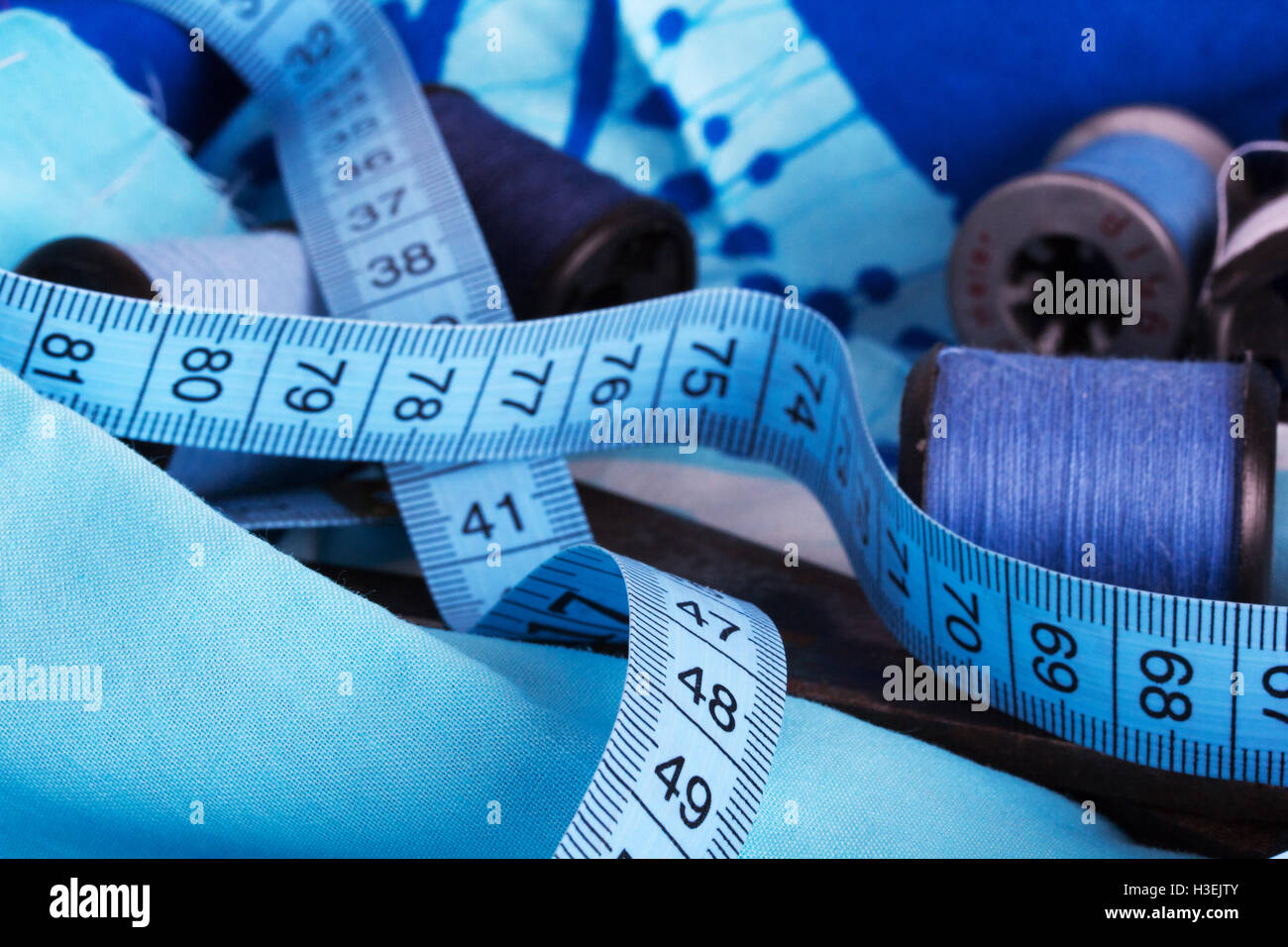 Various sewing equipment in shades of blue Stock Photo - Alamy