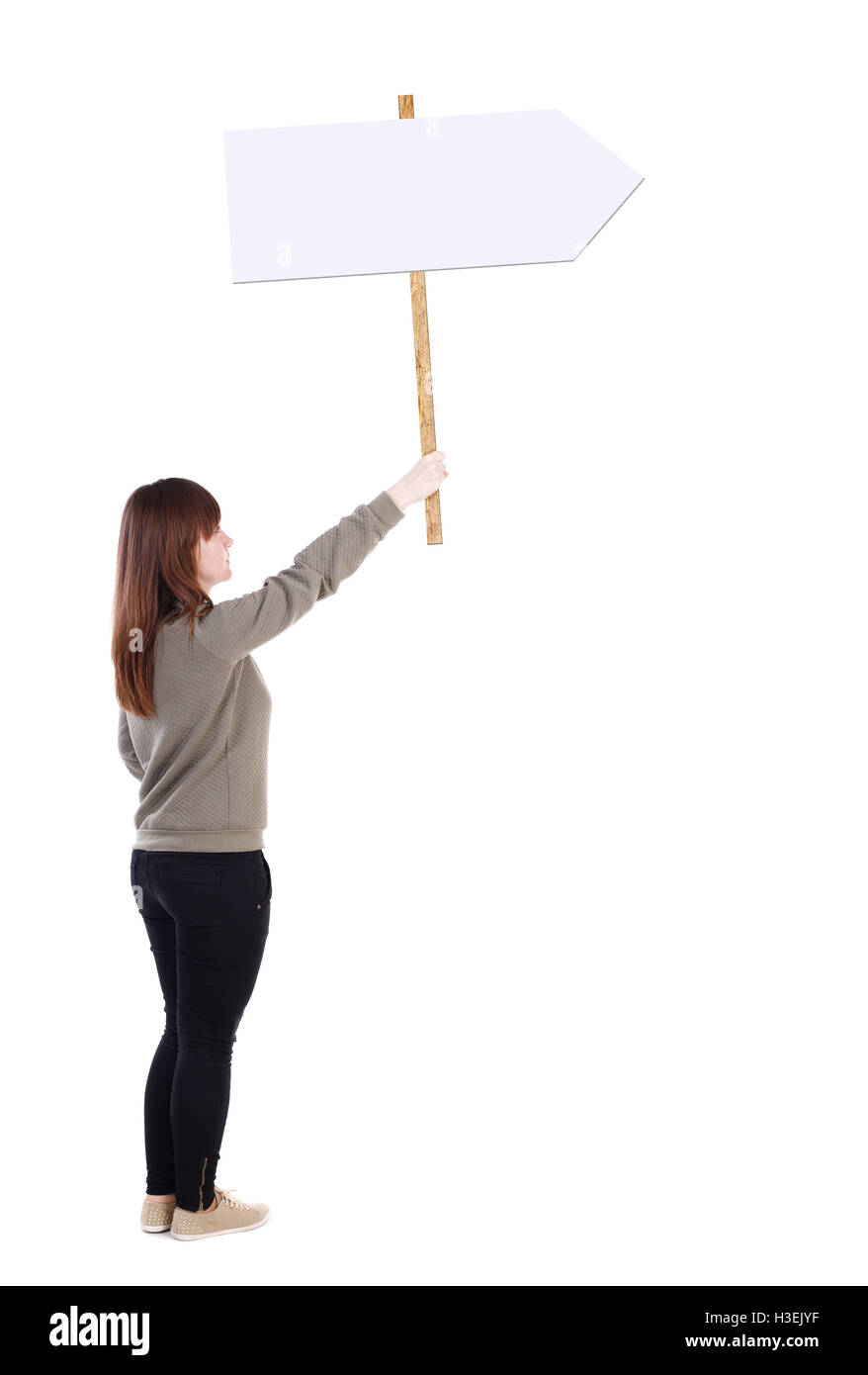 Back view woman showing sign board. man holds information plate. Rear ...