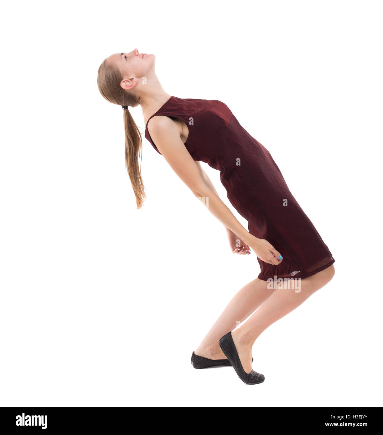 Balancing young woman. or dodge falling woman. Rear view people ...