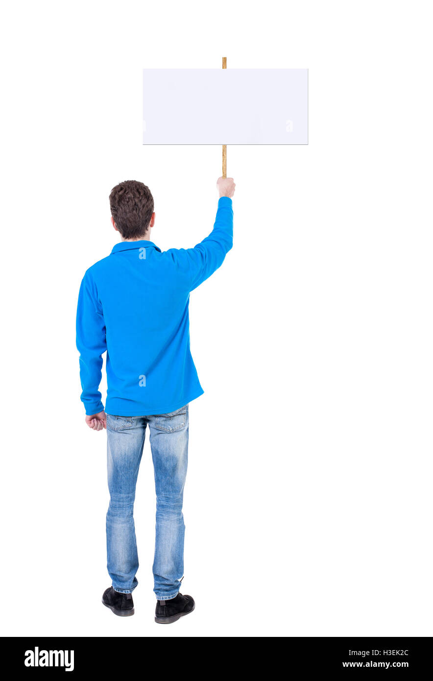 Back view man showing sign board. man holds information plate. Rear ...