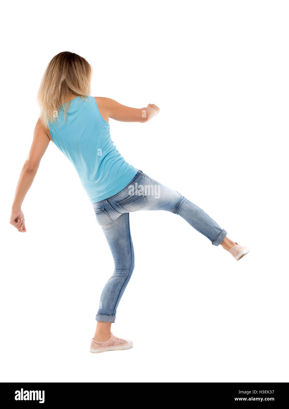 skinny woman funny fights waving his arms and legs Stock Photo - Alamy