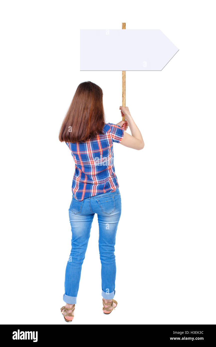 Back view woman showing sign board Stock Photo - Alamy