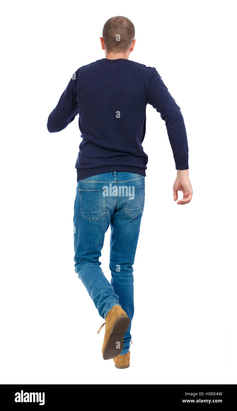 Back view of going handsome man Stock Photo - Alamy