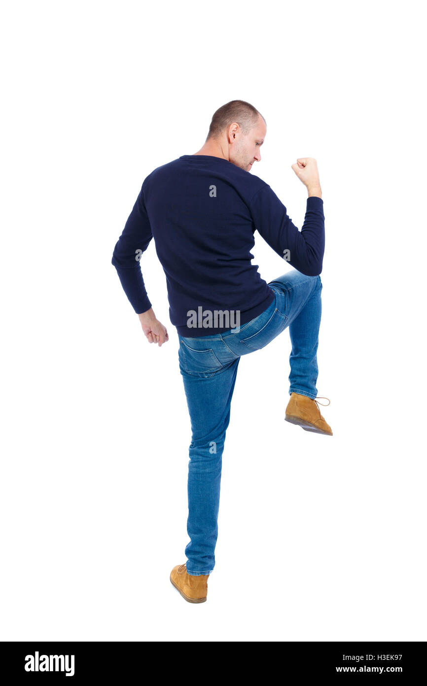 Back view man raised fist Cut Out Stock Images & Pictures - Alamy