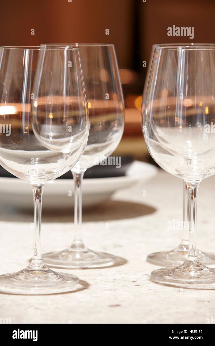 Wine glass ready to be serve on a table restaurant. Vertical Stock ...