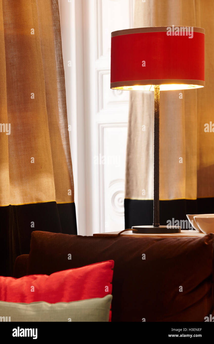Home interior with red lamp and window with curtains. Vertical Stock ...