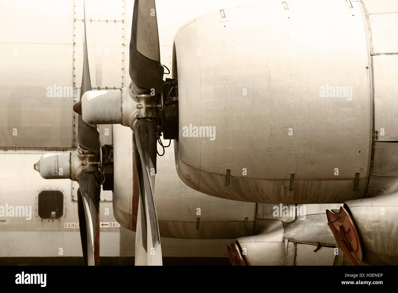 Old aircraft propeller engines airframe and blades in warm tone ...