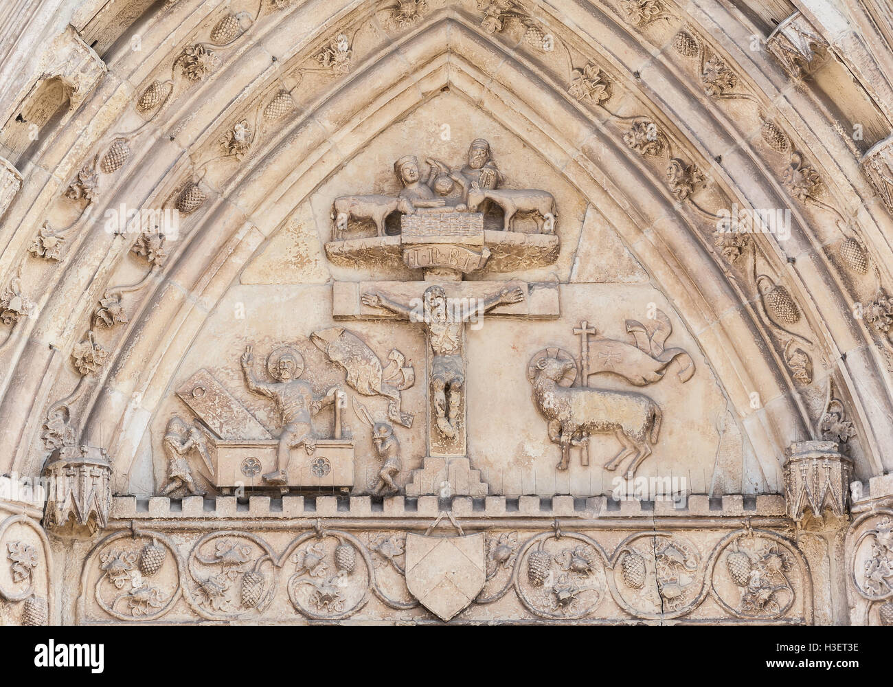 Christian relief(of the 14th century) on the facade of a church ...