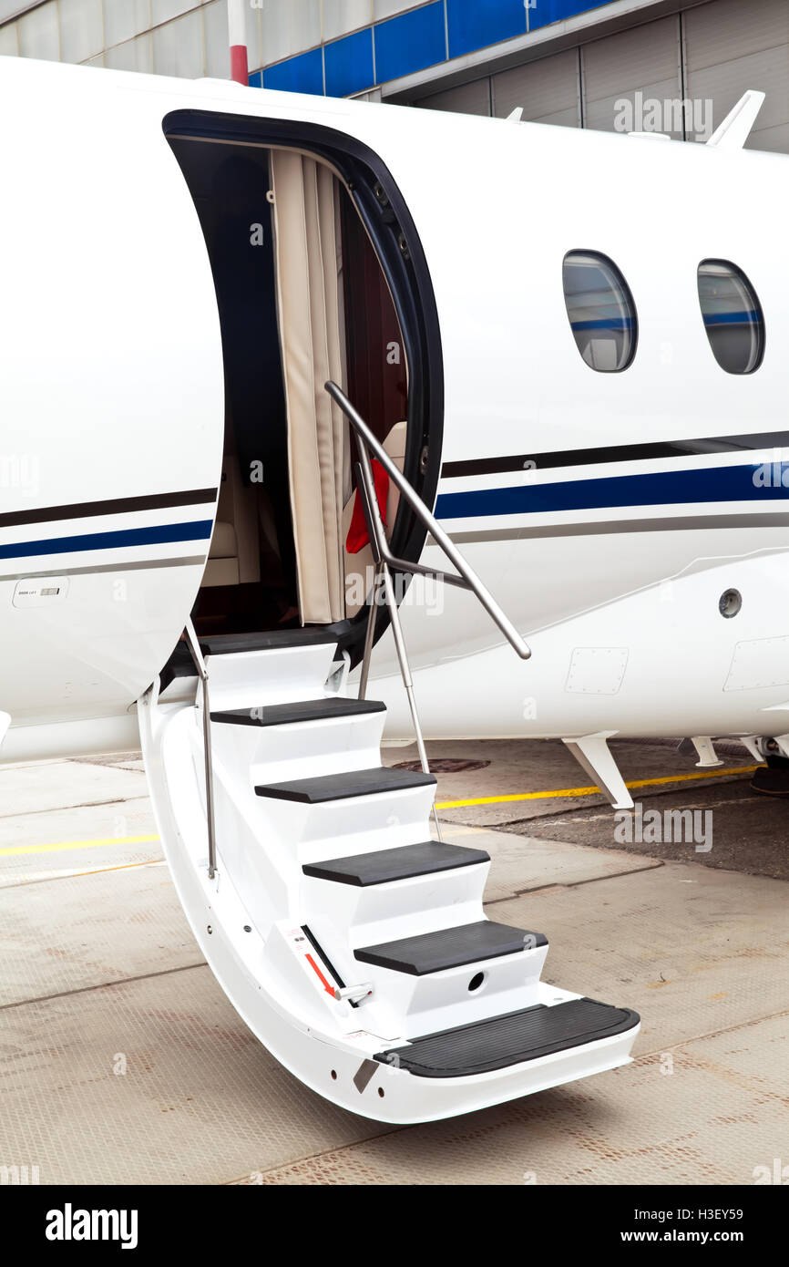 Business jet ladder Stock Photo - Alamy