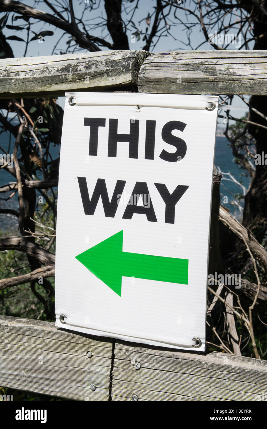 THIS WAY indicating arrow Stock Photo - Alamy
