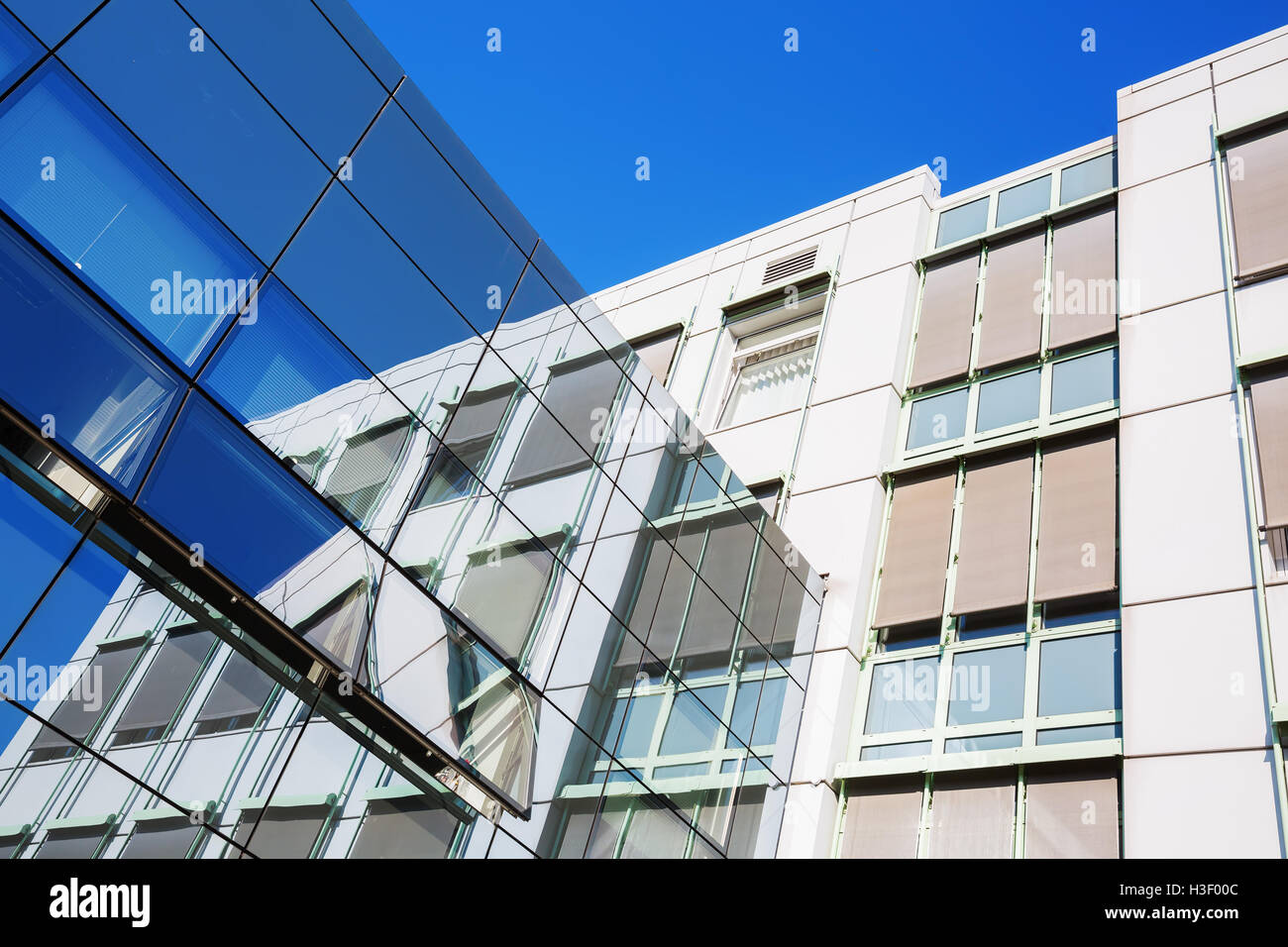 detail of an office building with glass facade Stock Photo - Alamy