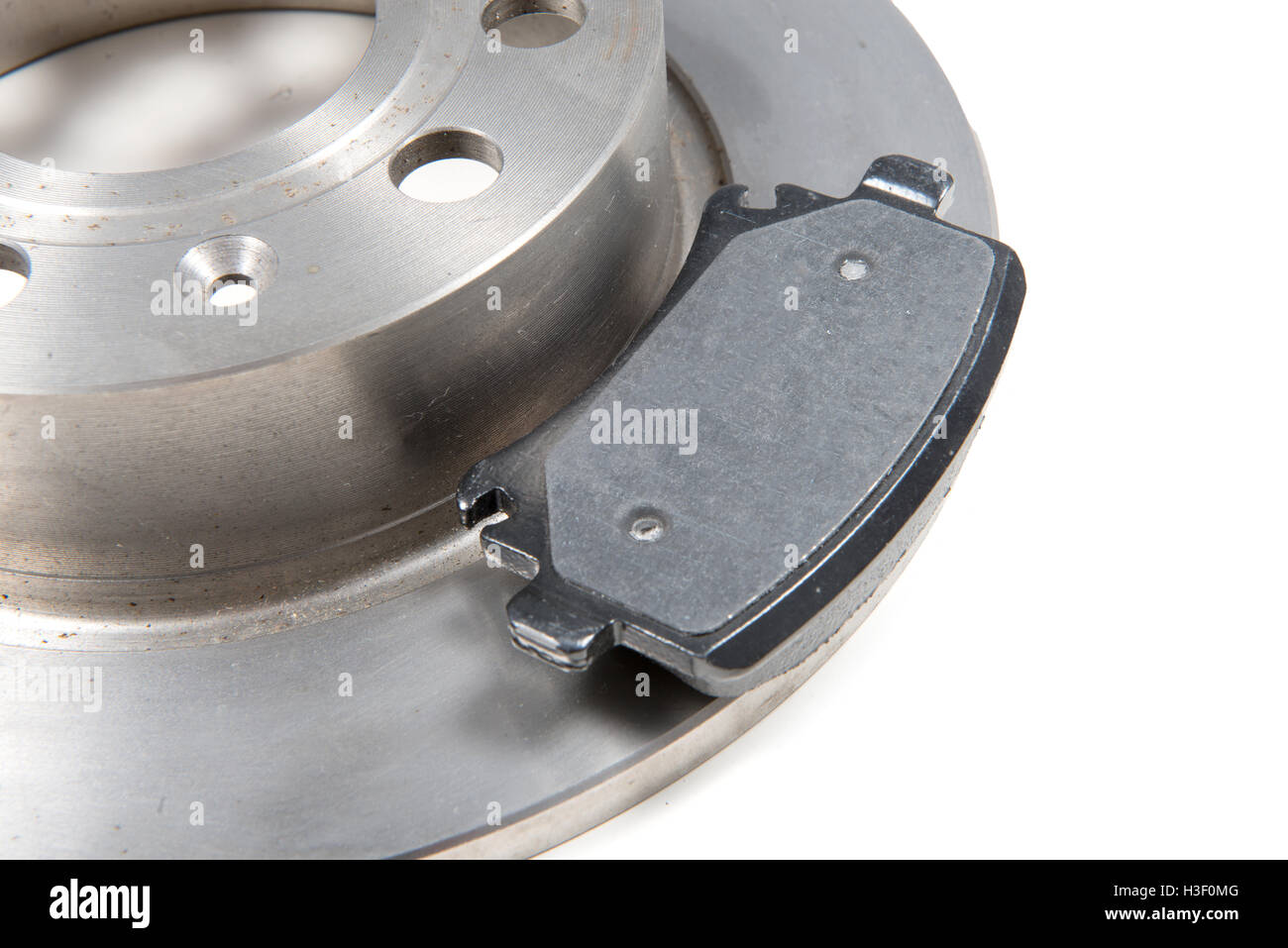 a car brake disc and pads on white background Stock Photo - Alamy