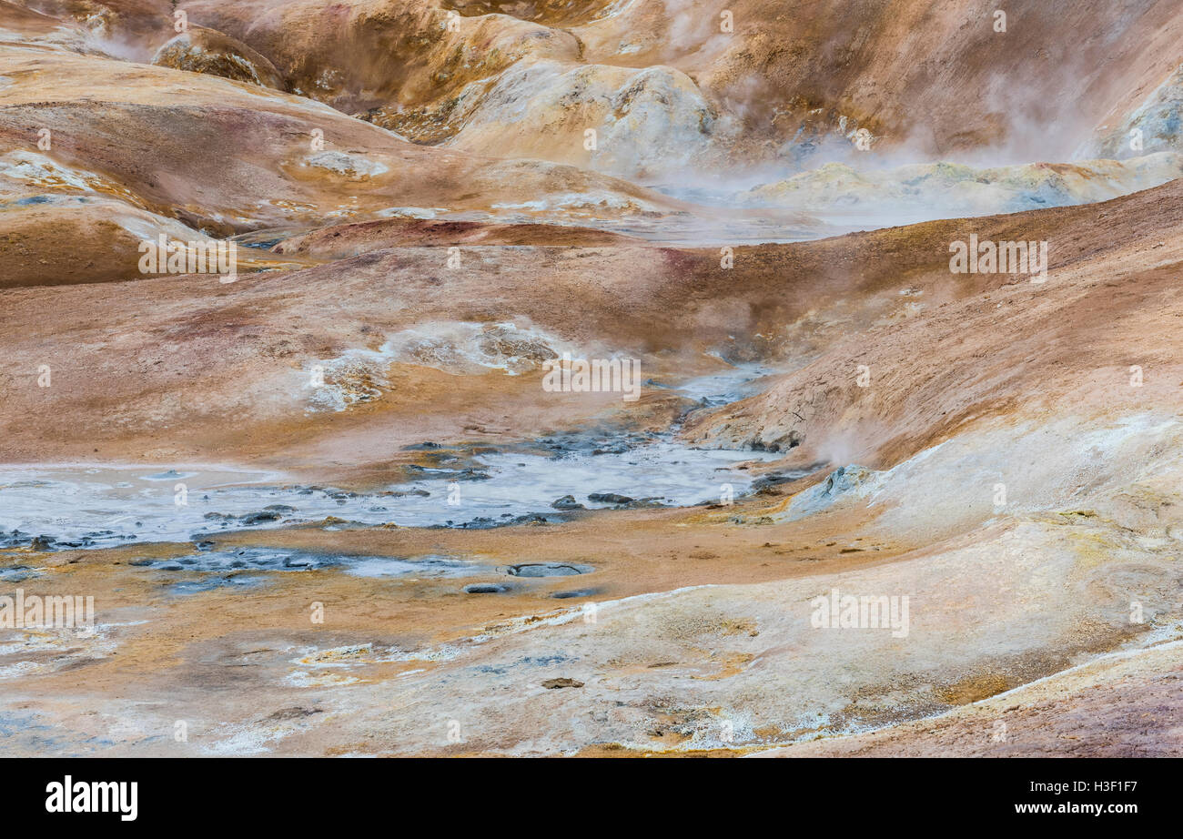 Geothermal landscape Krafla on Iceland with red dirt, a hot water ...