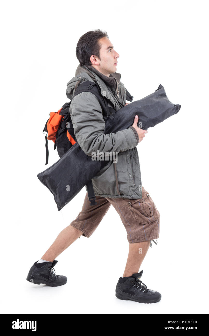 young latin guy carrying backpack Stock Photo - Alamy