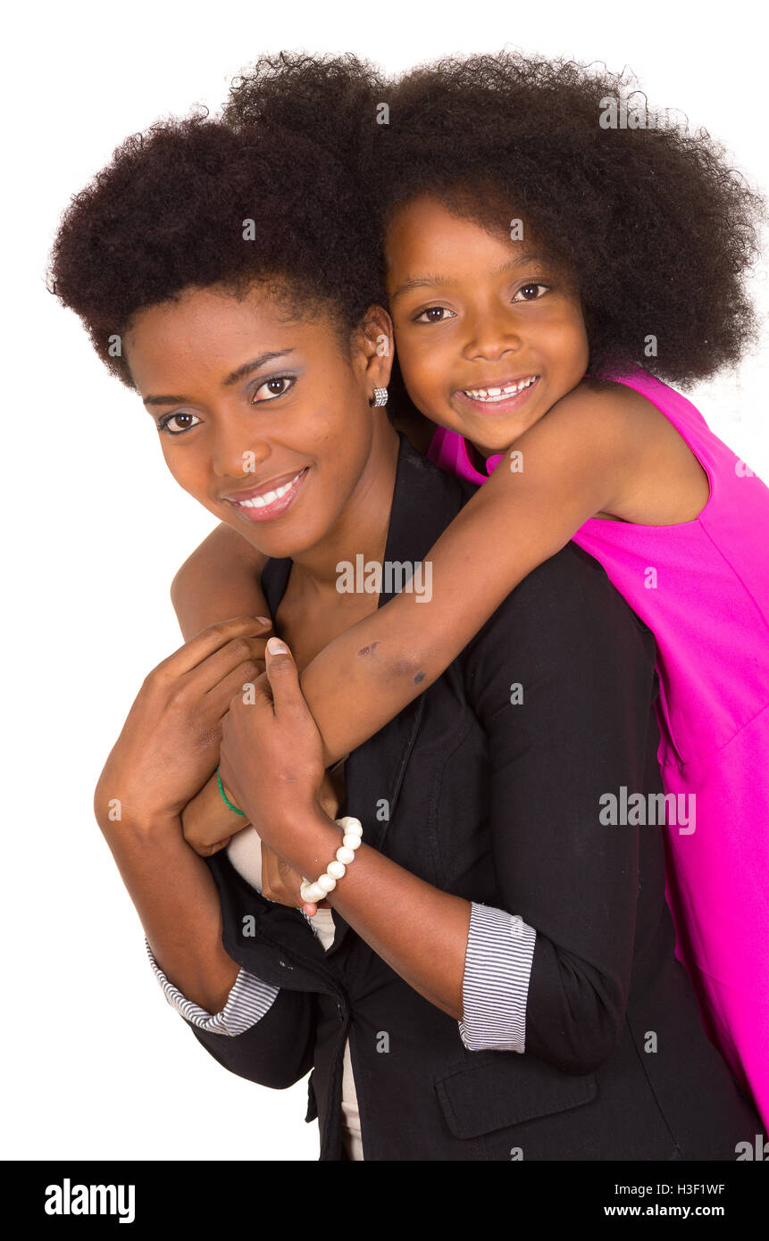 Black mother daughter posing happily Stock Photo - Alamy