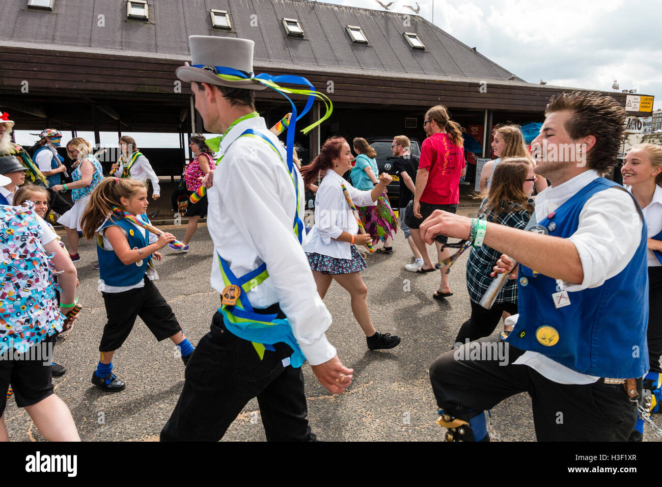 Women, both from Morris sides and members of the public, dancing the ...