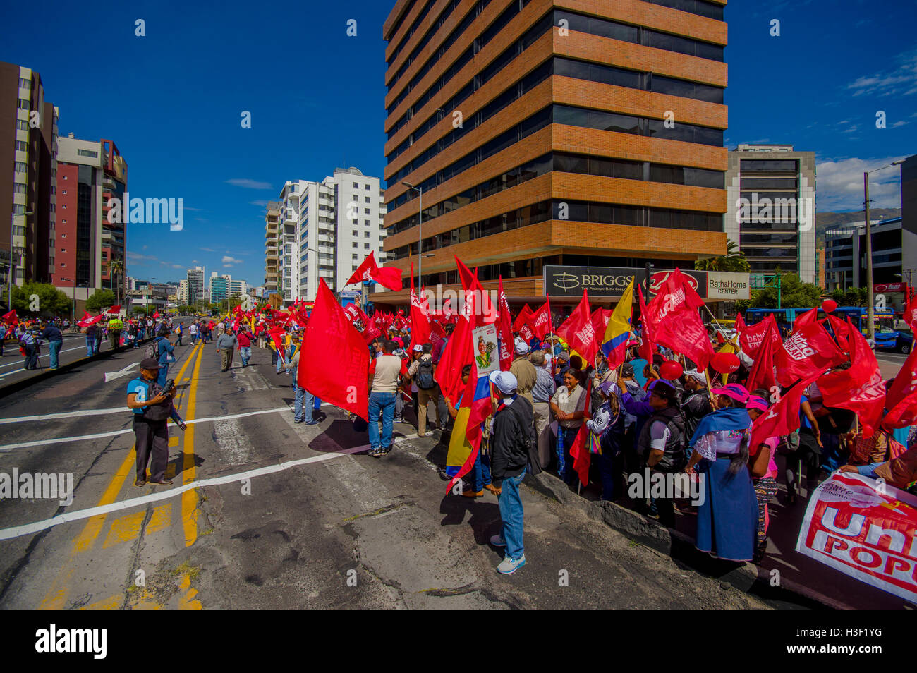 Protesters with red flags from Union Popular party marching in the ...
