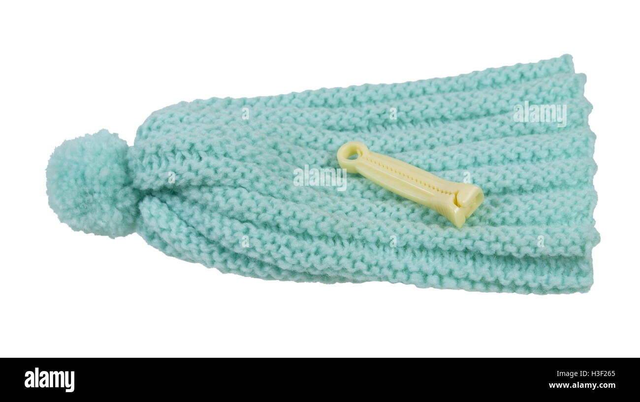 Yellow umbilical cord clamp used to clamp off the umbilical cord after ...