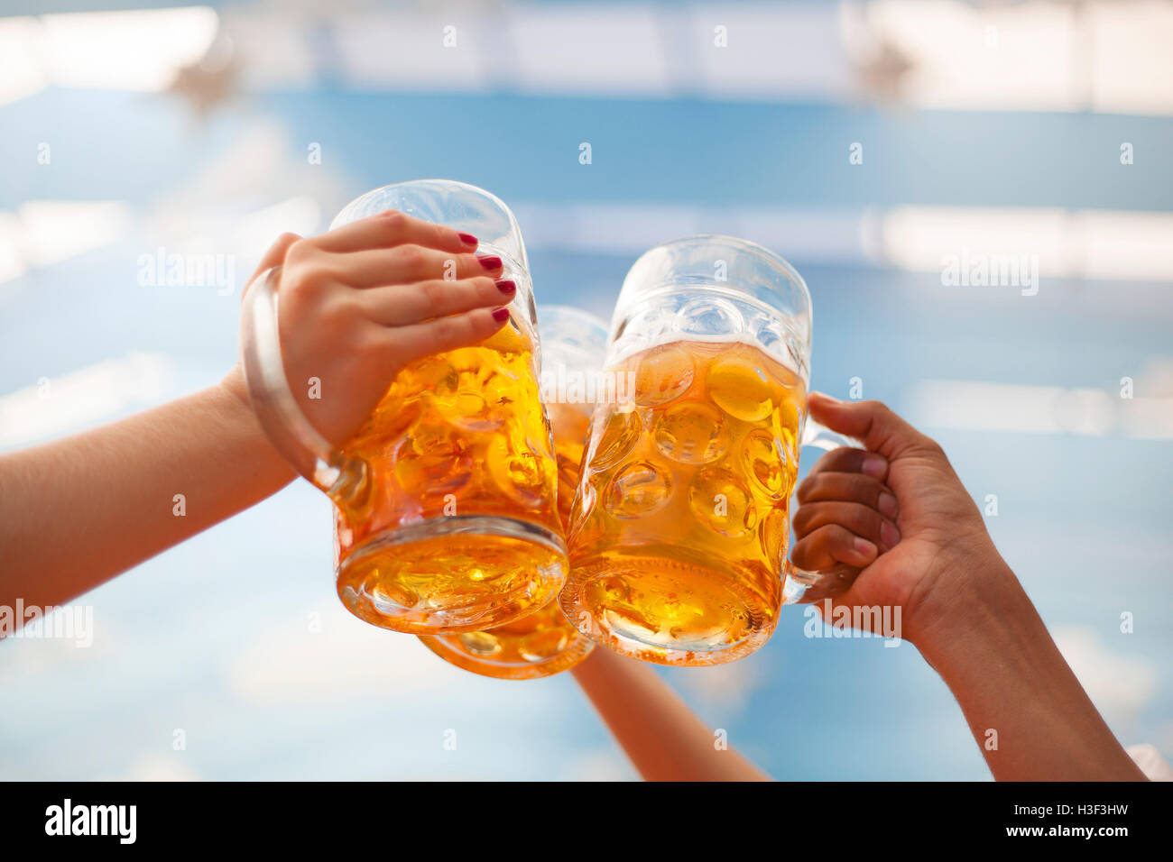 Raised beer glasses hi-res stock photography and images - Alamy