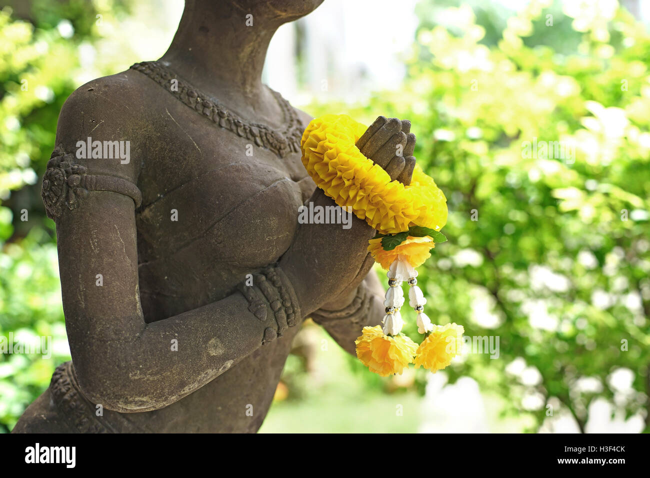 old stone statue detail of praying hand Stock Photo - Alamy