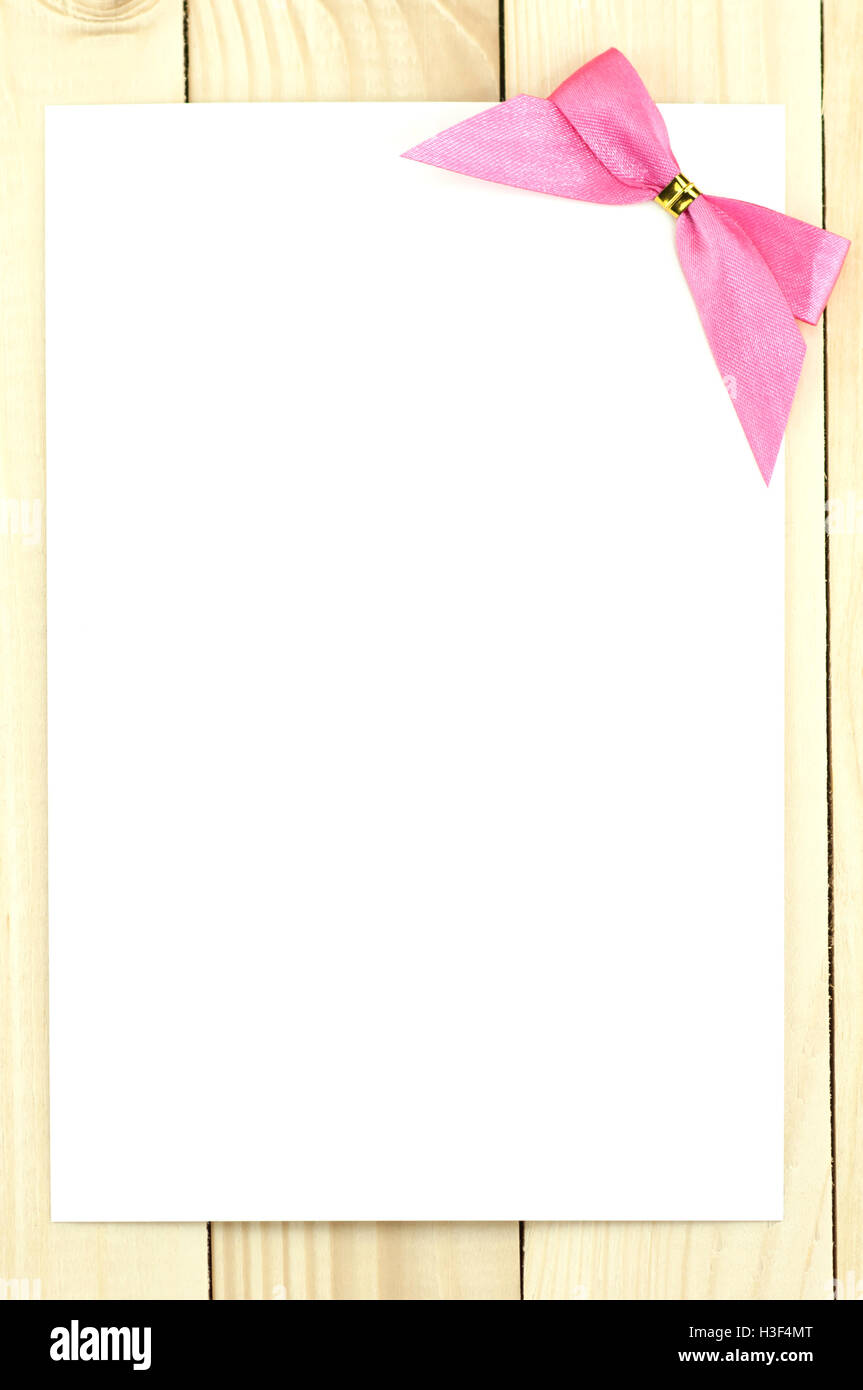 White card with pink ribbon, pink bow Stock Photo - Alamy