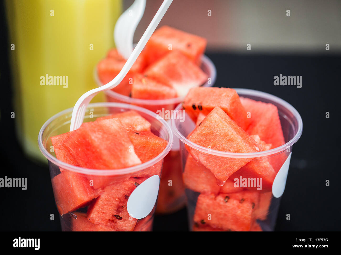 close up of chopped watermelon in plastic cups Stock Photo - Alamy
