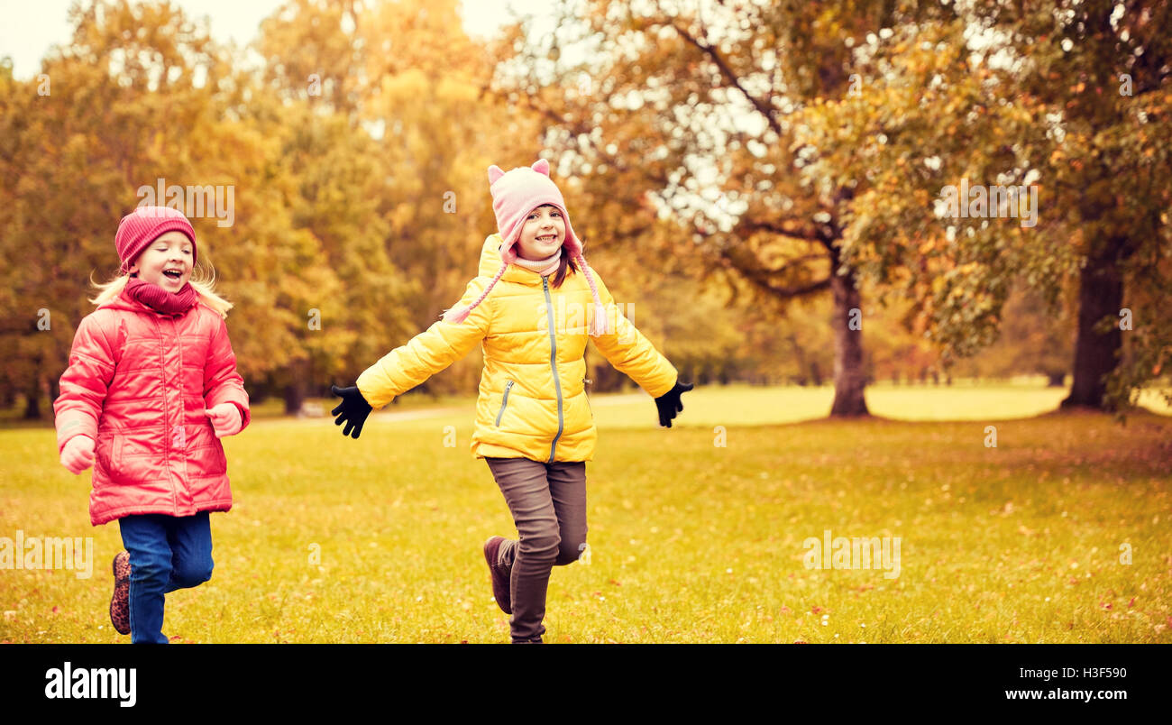 group of happy little girls running outdoors Stock Photo - Alamy