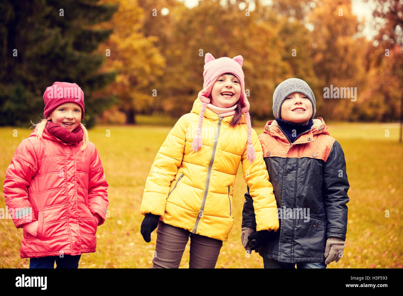 group of happy children in autumn park Stock Photo - Alamy