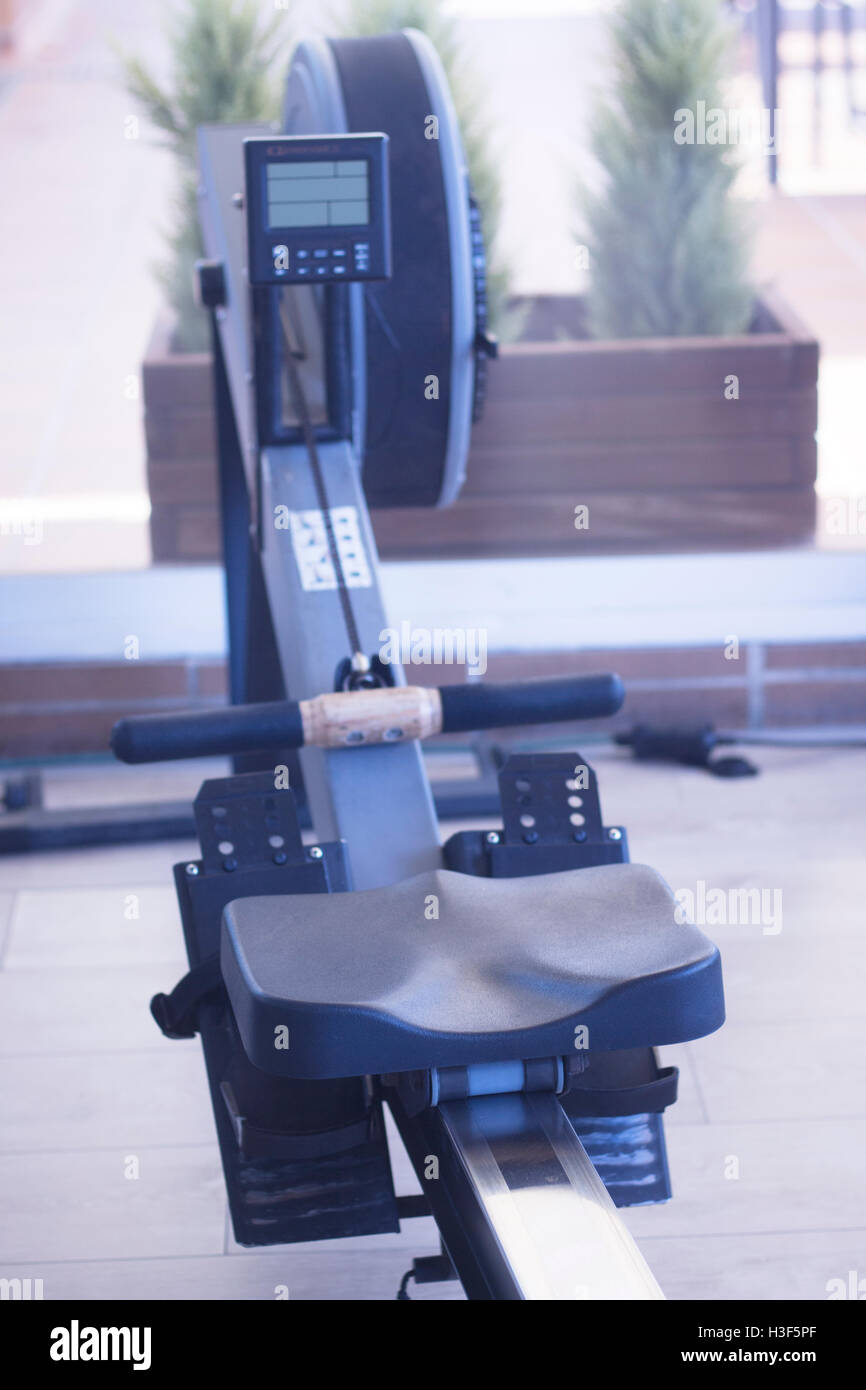 Gym exercise rowing machine static rower in fitness studio Stock Photo ...