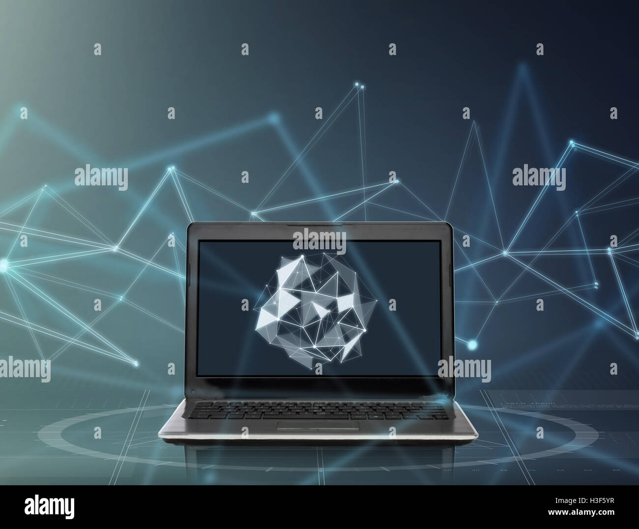 laptop with low poly shape on screen Stock Photo - Alamy