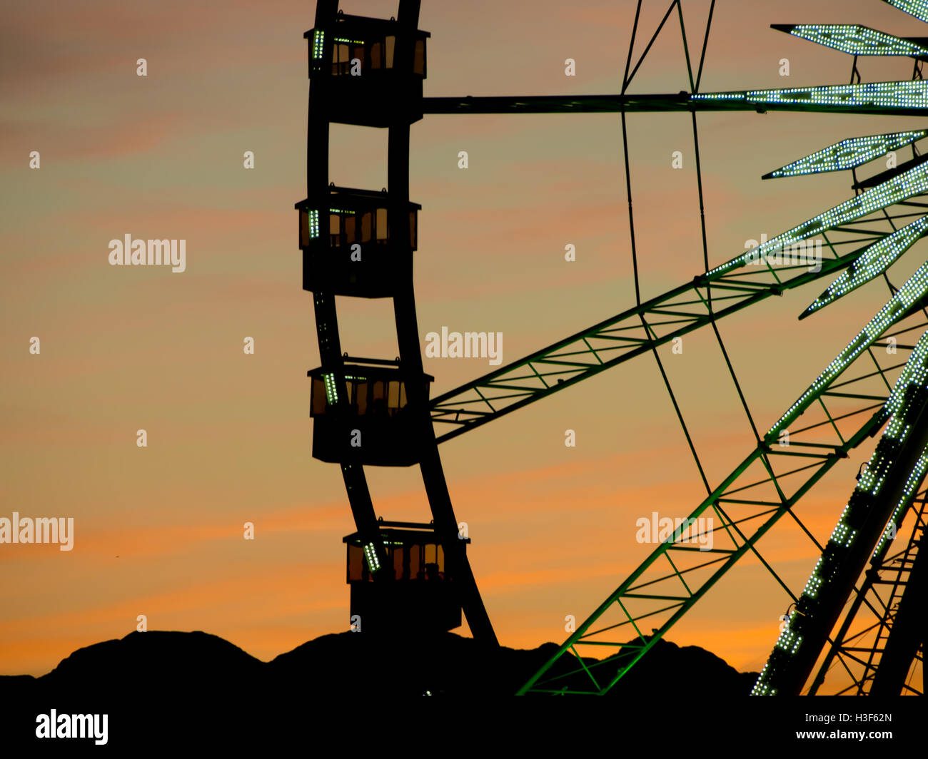 Detail And Silhouette of Ferris Wheel with Sun Set Stock Photo - Alamy