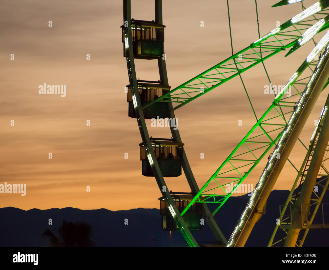 Detail And Silhouette of Ferris Wheel with Sun Set Stock Photo - Alamy