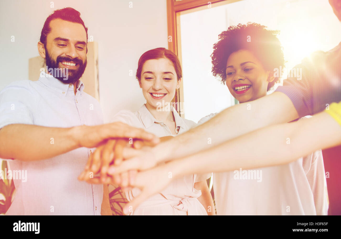 happy creative team in office Stock Photo - Alamy