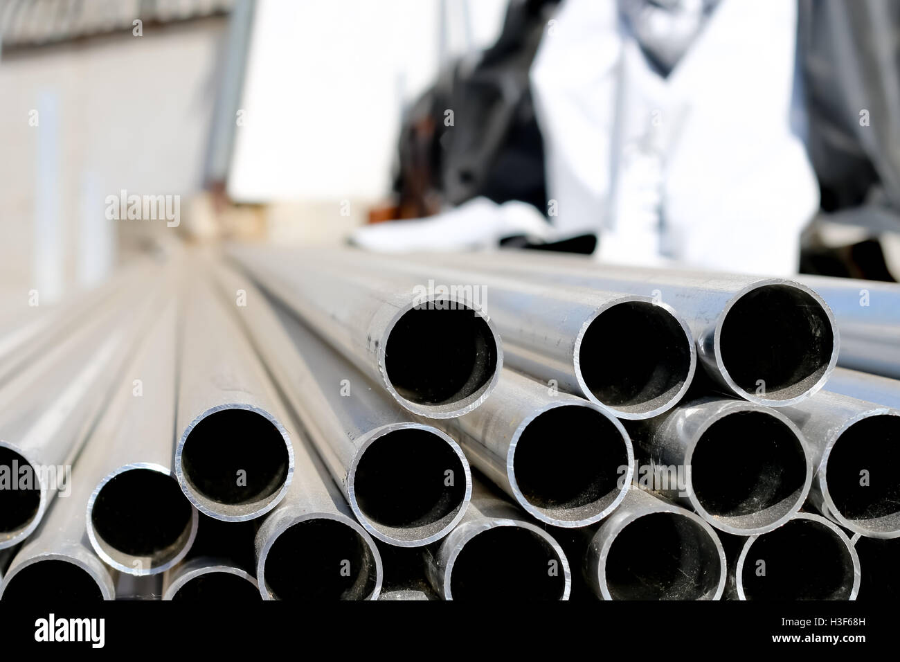Stack of Many Pipes at the Construction Site Stock Photo - Alamy