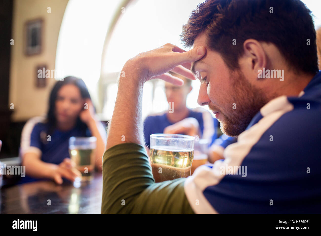 Soccer fans at pub hi-res stock photography and images - Alamy