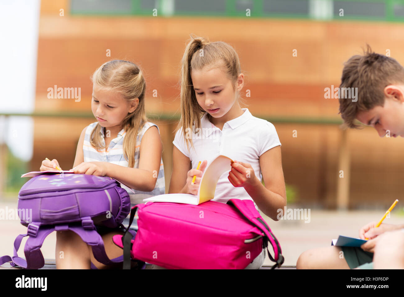 group of happy elementary school students outdoors Stock Photo - Alamy