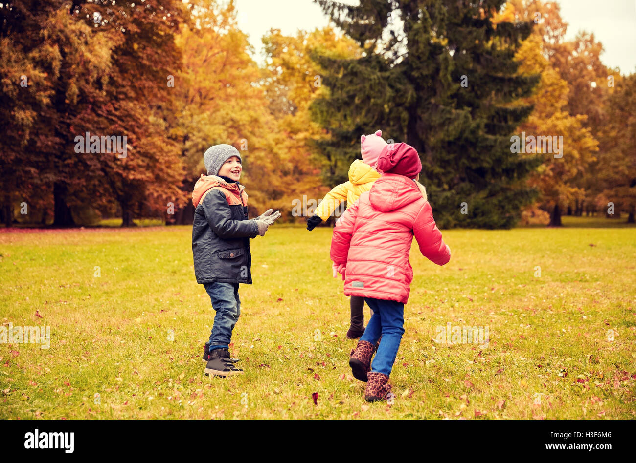group of happy little kids having fun outdoors Stock Photo - Alamy