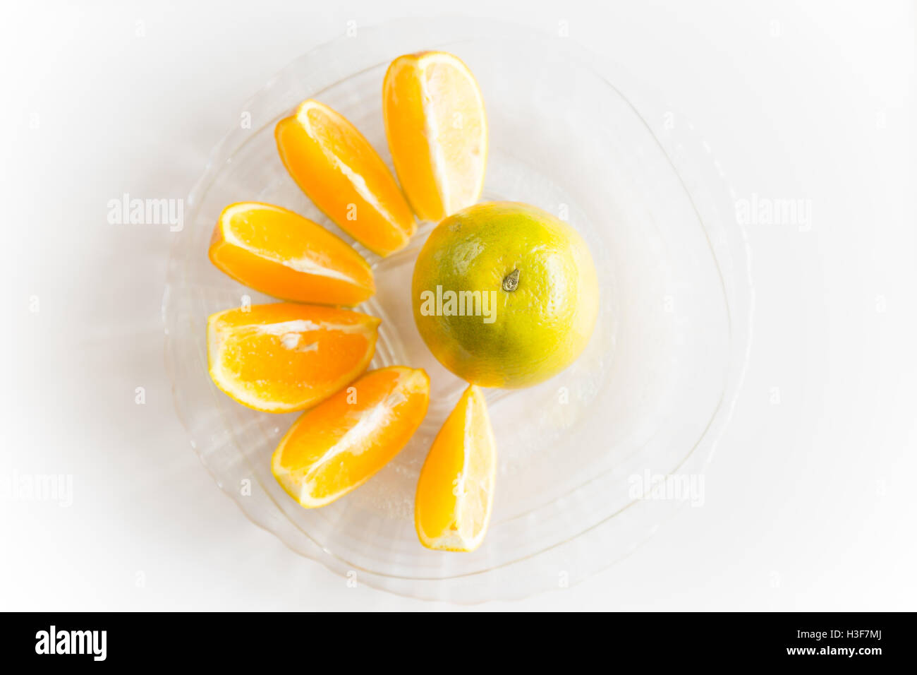 Fresh Brazilian orange (Laranja-Pêra) fruit cutted, whole fruit, on ...